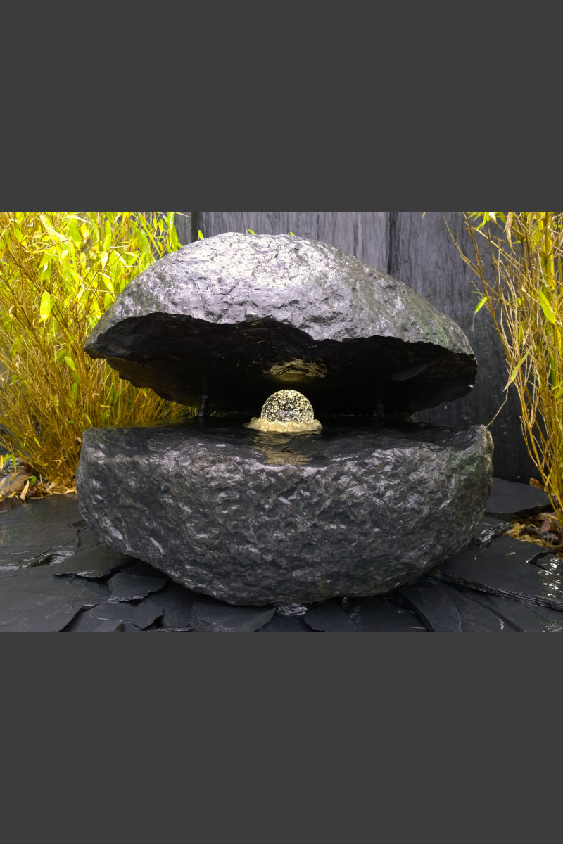 Basalt Auster Quellstein mit drehender Glaskugel - Kugeln - Specials ...